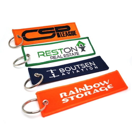 Remove before flight tag with custom logo